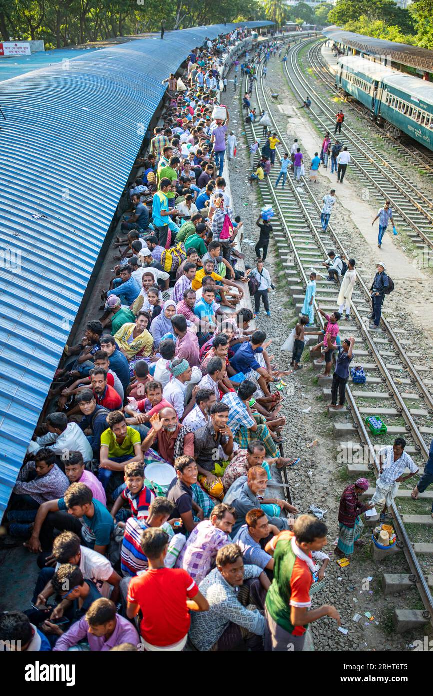 An overcrowded train leaves the Airport Railway Station in Dhaka ahead ...