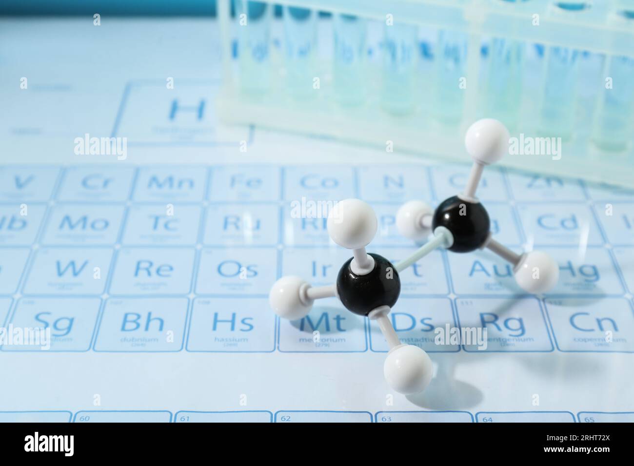 Molecular model and test tubes on periodic table Stock Photo - Alamy