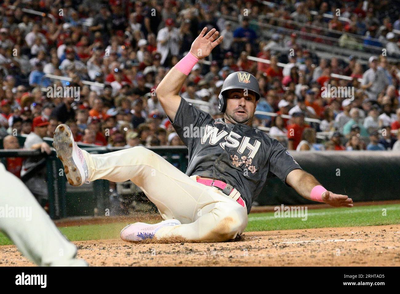 Washington Nationals' Jake Alu scores on a single by Blake Rutherford ...