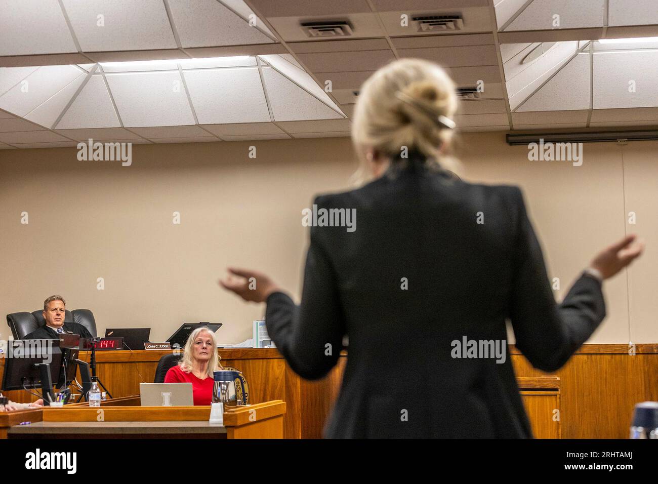 Judge John Judge listens to Ingrid Batey speak during a hearing for ...
