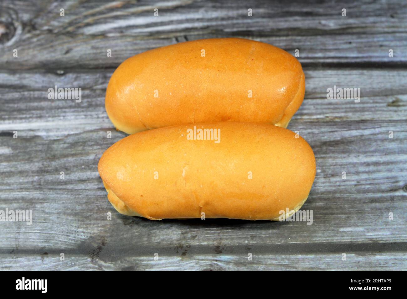 Hot dog bun is a type of soft bun shaped specifically to contain a hot ...