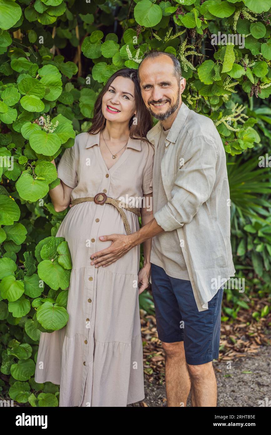 A blissful scene in the park as a radiant pregnant woman after 40 and ...