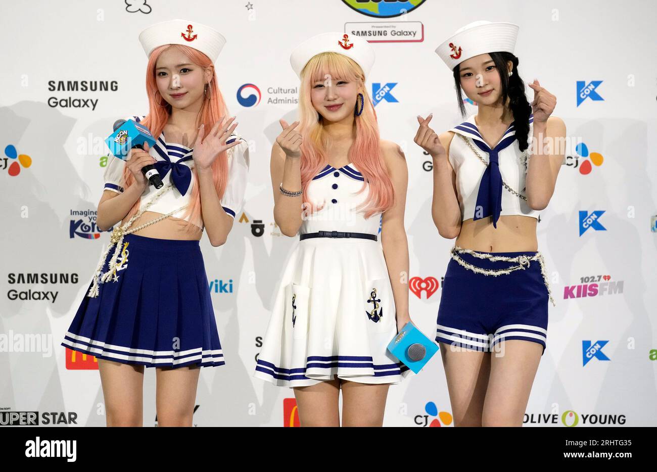 MiU, from left, Suhye and Gaeun, of South Korean group LimeLight ...