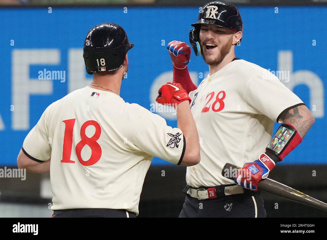 Texas Rangers' Mitch Garver (18) celebrates after his solo home run ...