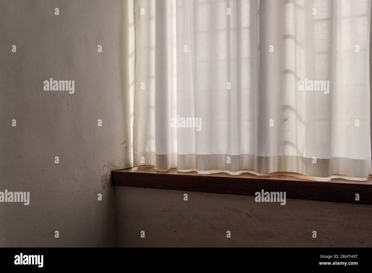 Selective focus interior view at translucent white curtain with the sun ...