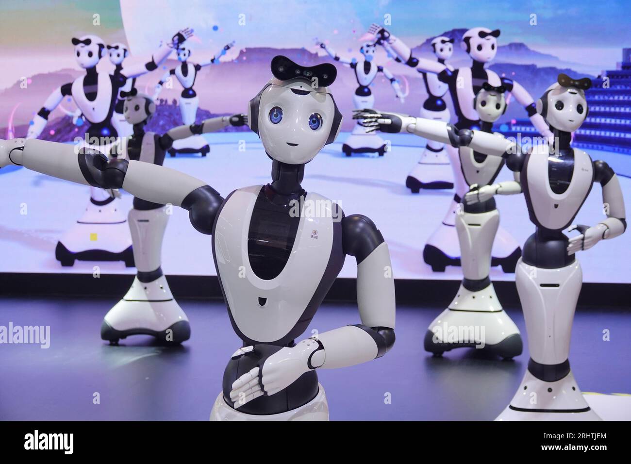 BEIJING, CHINA - AUGUST 18, 2023 - Humanoid robots perform a dance ...