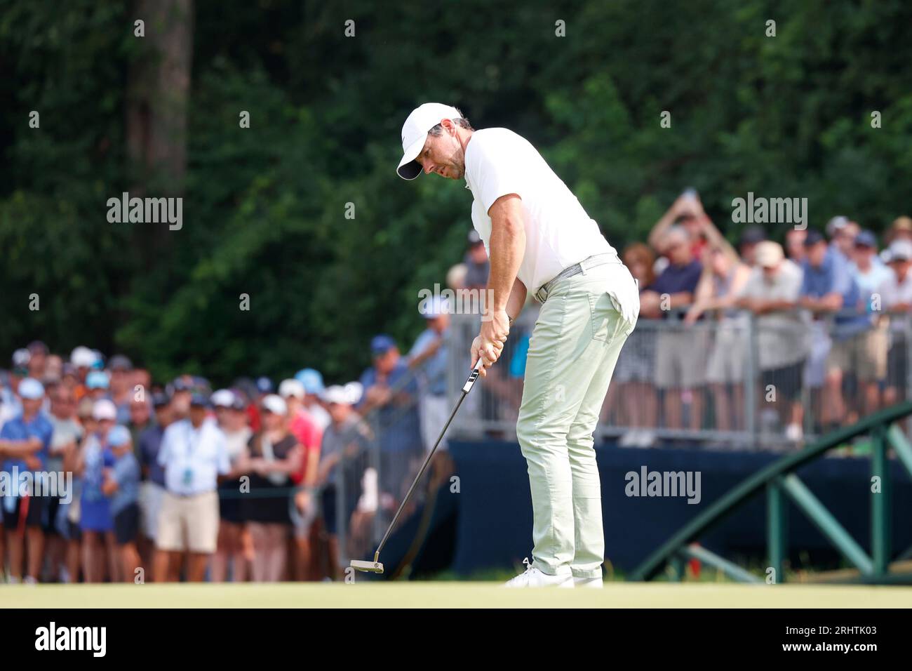 OLYMPIA FIELDS, IL - AUGUST 18: PGA golfer Rory McIlroy putts on the 16th hole during the second ...
