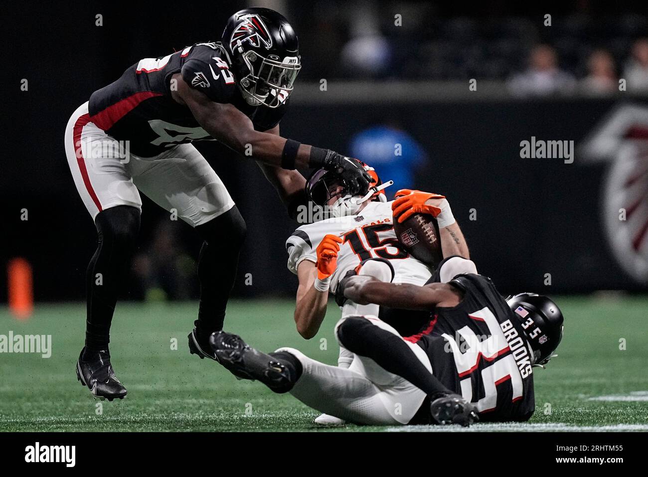 Cincinnati Bengals wide receiver Charlie Jones (15) is hit by Atlanta ...