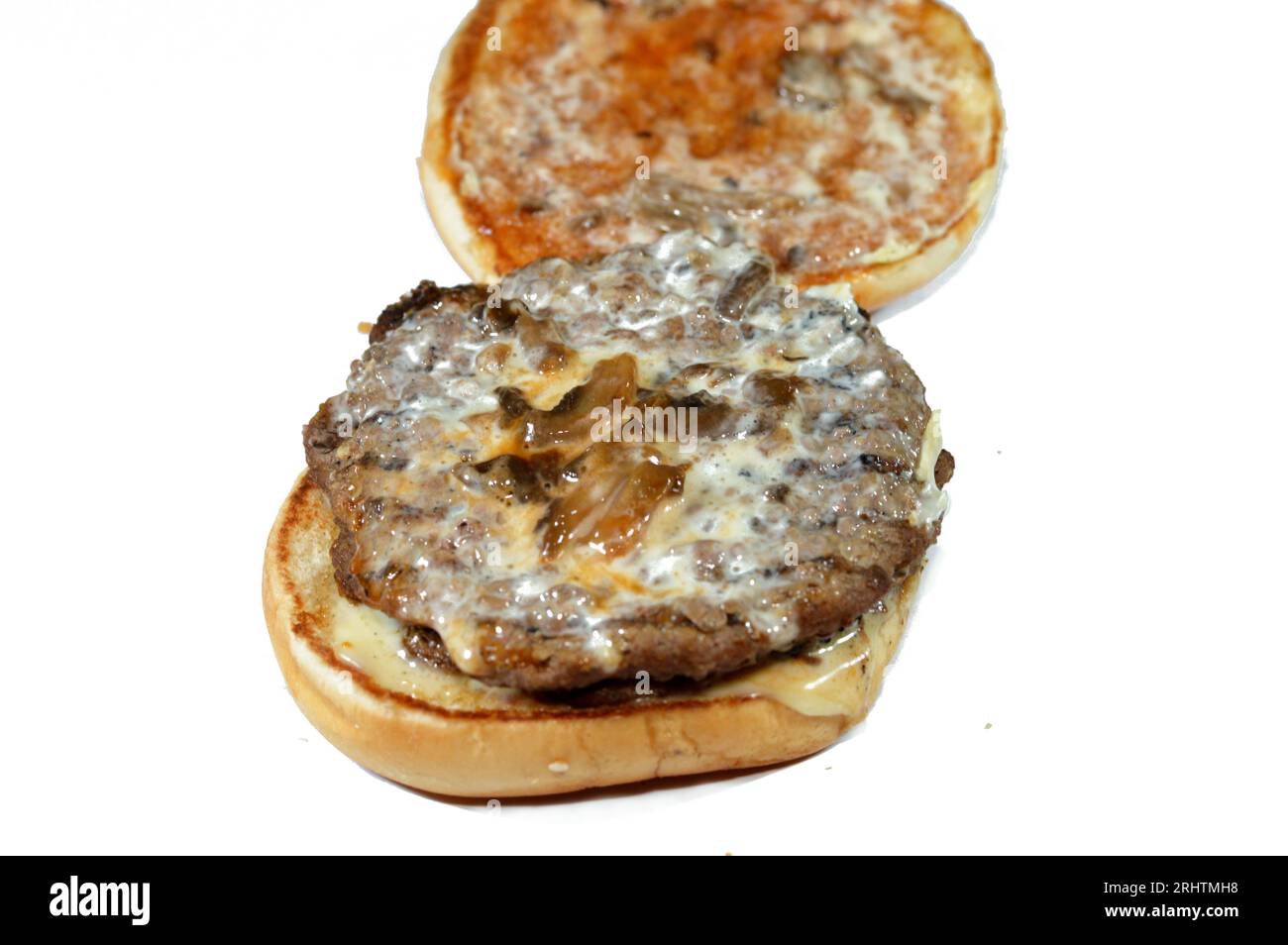 Double juicy thick beef patty with cheese covered with sauce, mushroom ...