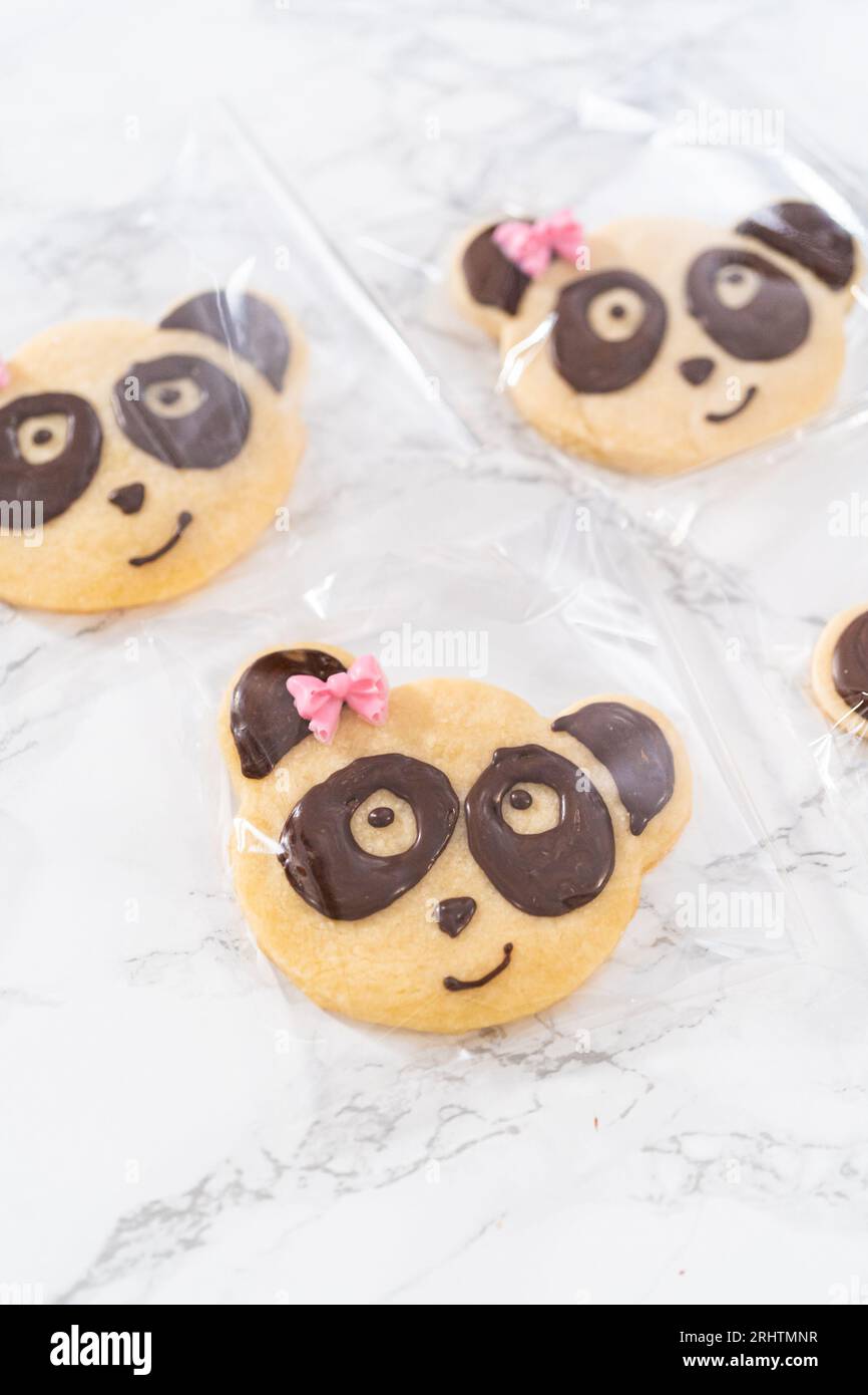 Panda shaped shortbread cookies with chocolate icing Stock Photo - Alamy