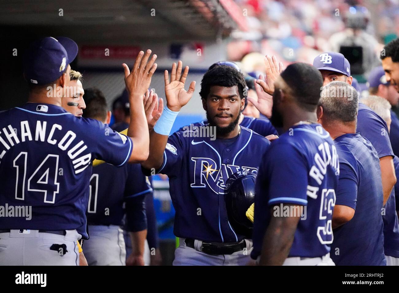 Tampa Bay Rays' Osleivis Basabe is congratulated after scoring agains ...