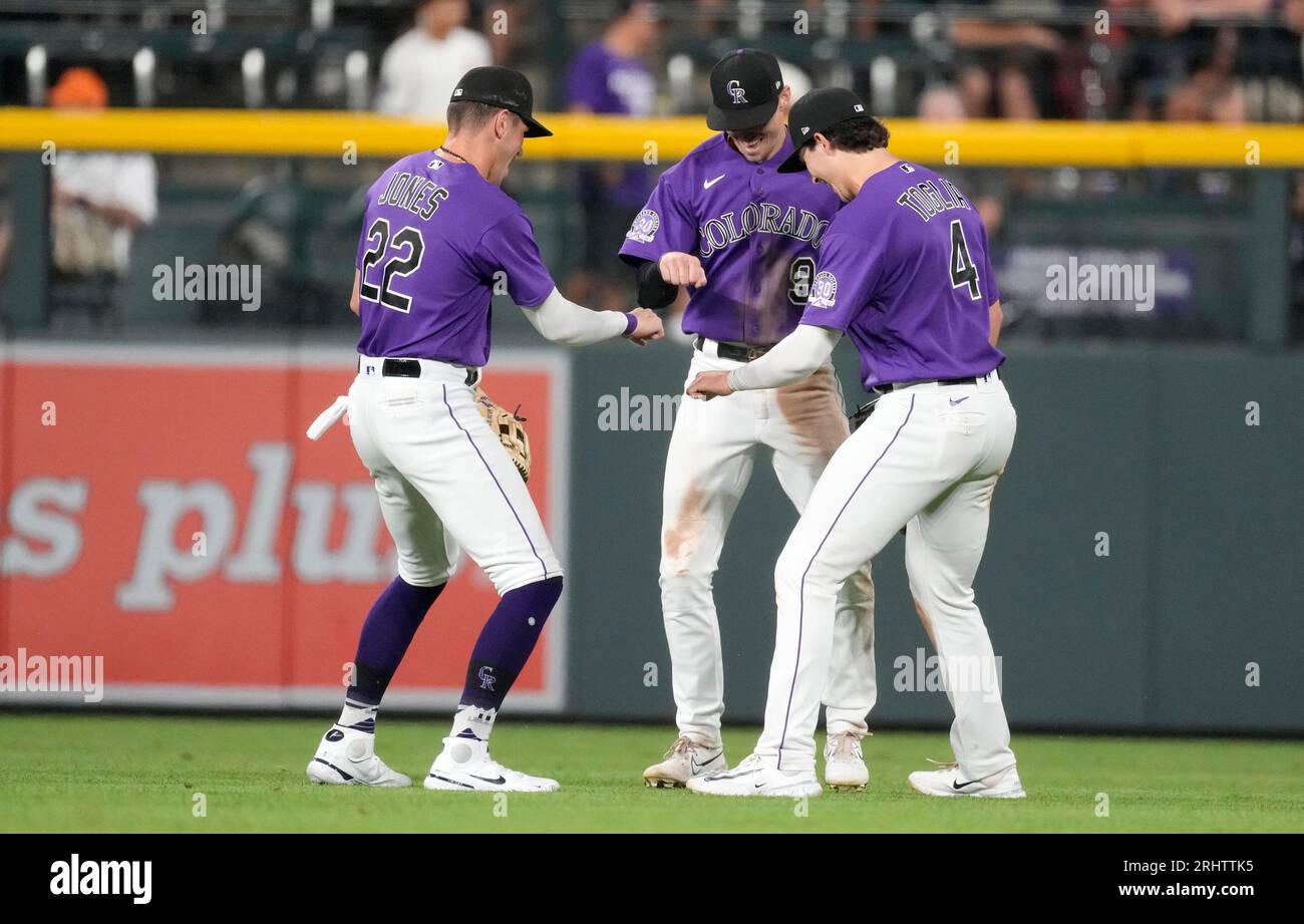 From left to right, Colorado Rockies left fielder Nolan Jones, center ...