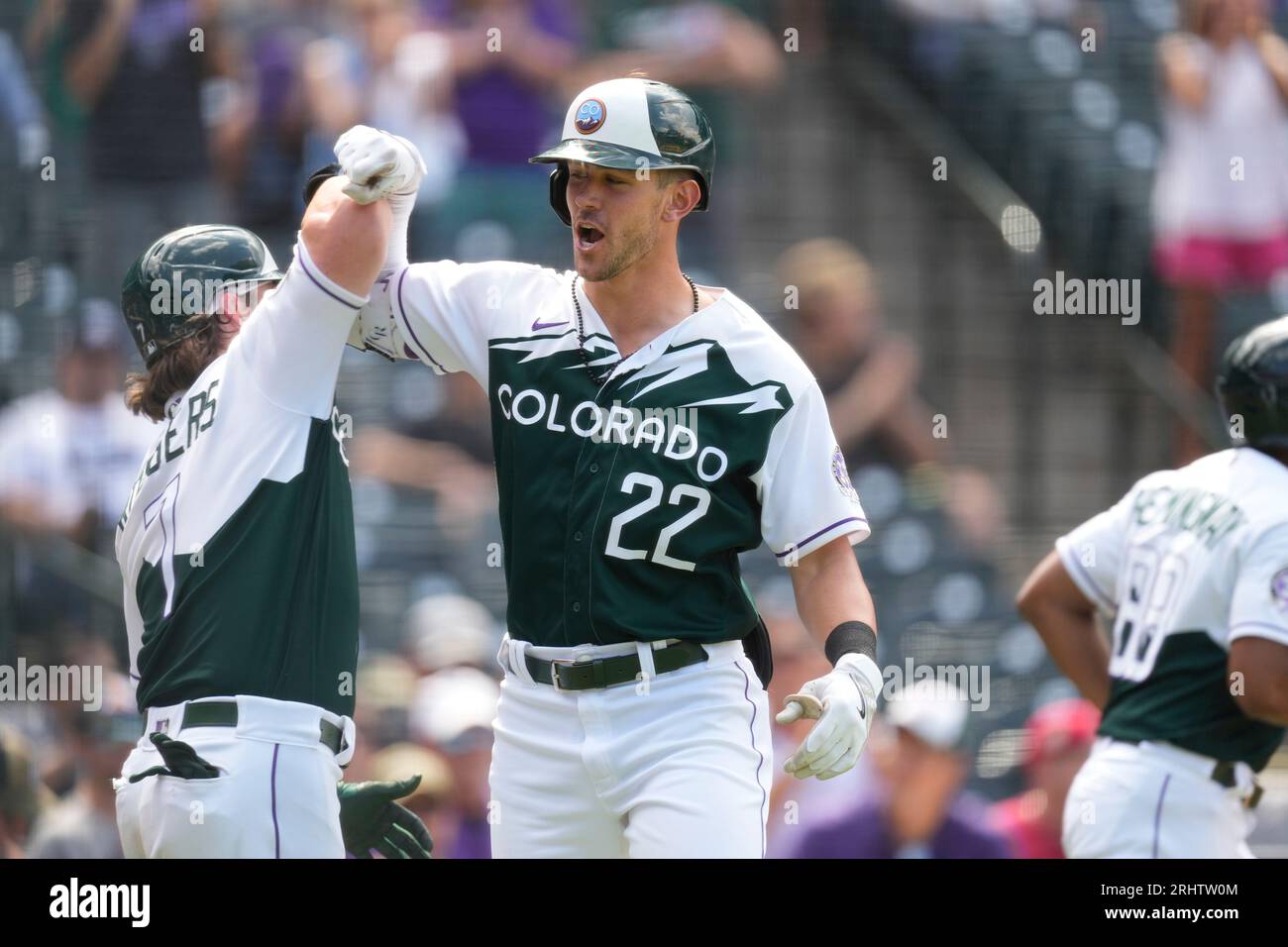 Colorado Rockies second baseman Brendan Rodgers (7) congratulates Nolan ...
