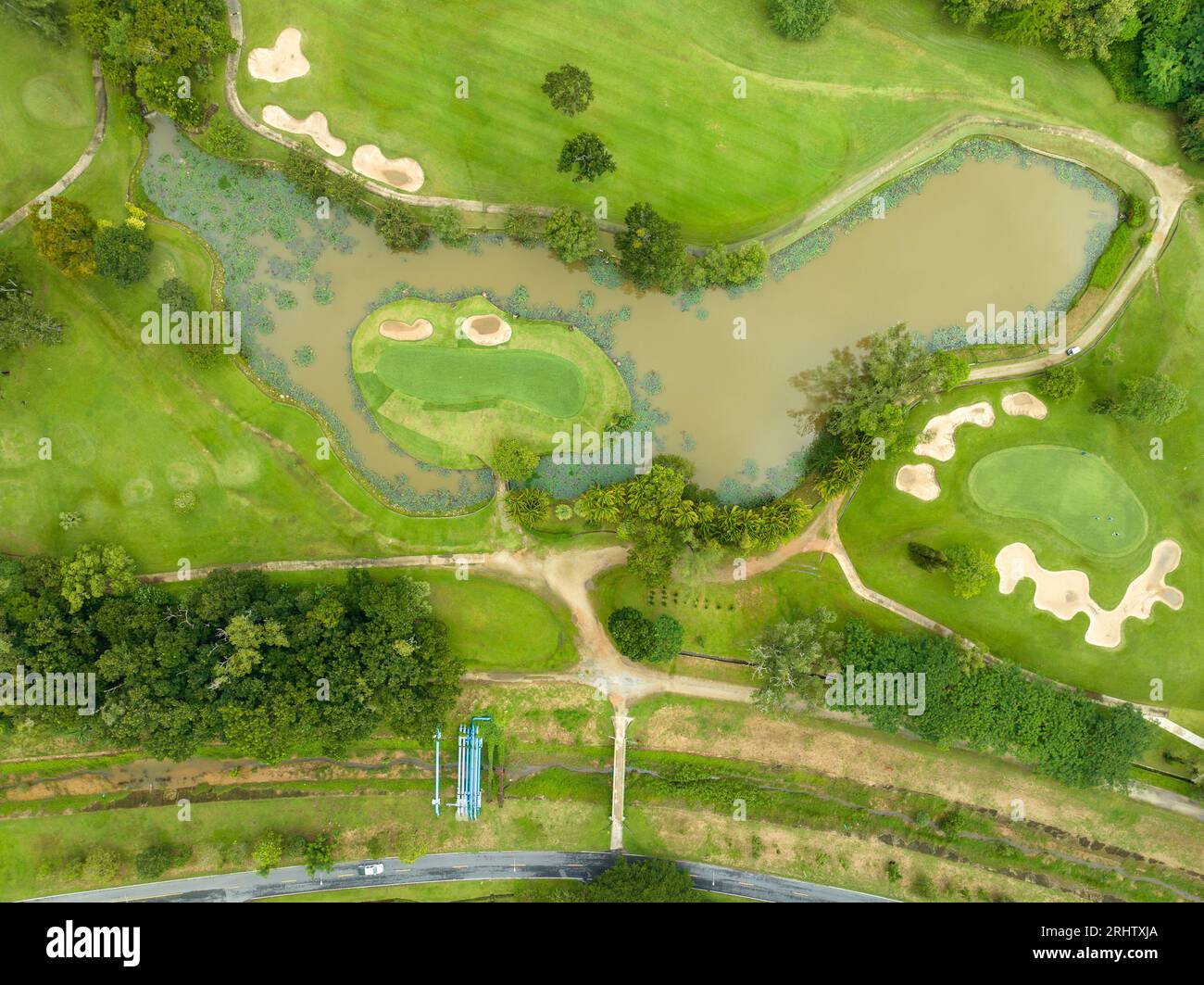 Aerial view drone shot of beautiful green golf field fairway and ...