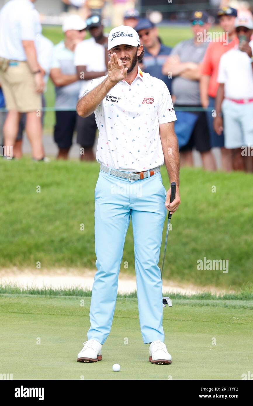 OLYMPIA FIELDS, IL - AUGUST 18: PGA golfer Max Homa lines up a putt on the 18th hole during the ...