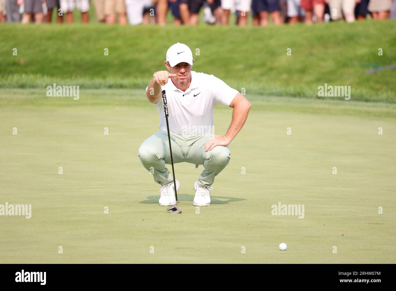 OLYMPIA FIELDS, IL - AUGUST 18: PGA golfer Rory McIlroy lines up a putt on the 18th hole during ...