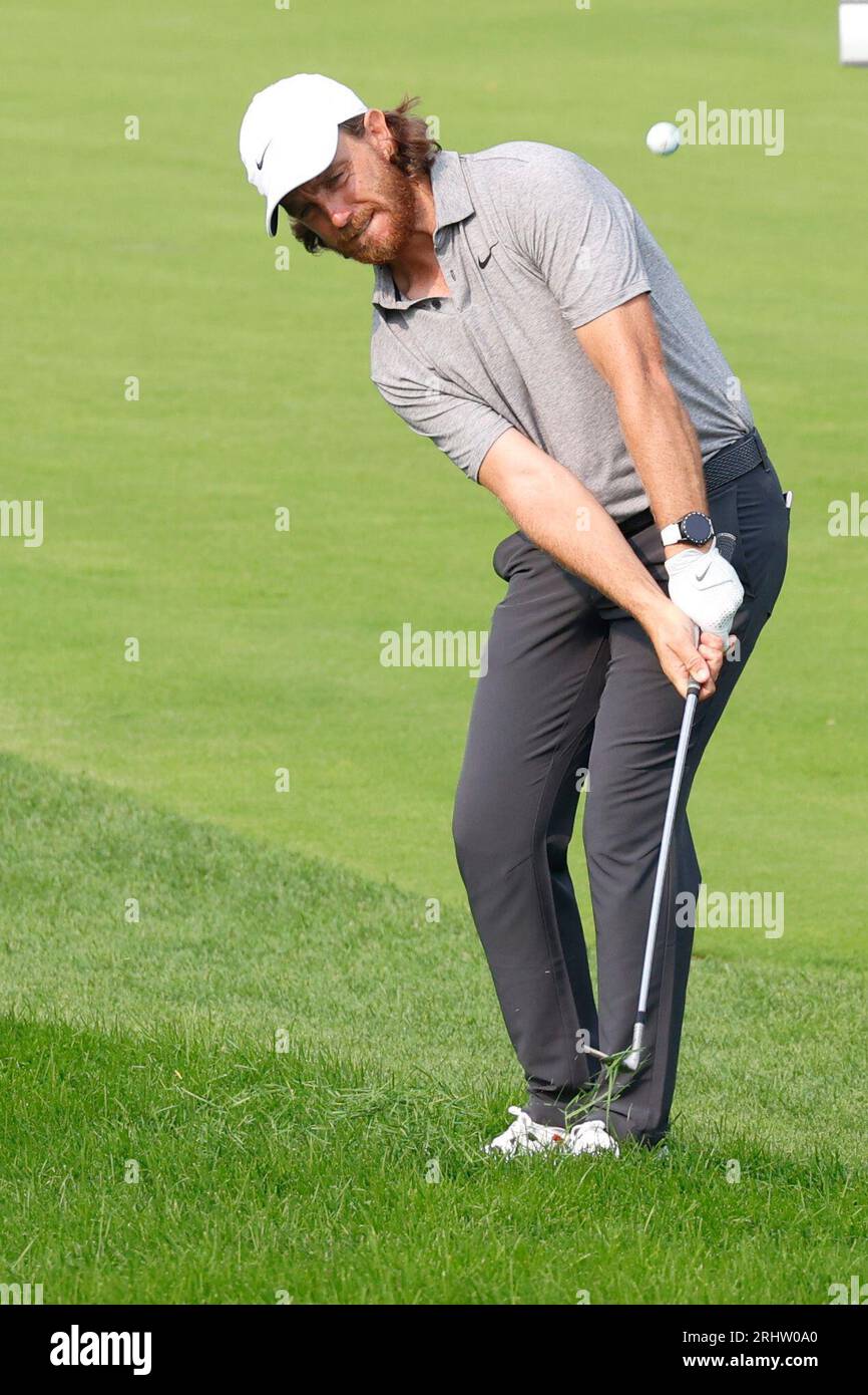 OLYMPIA FIELDS, IL - AUGUST 18: PGA golfer Tommy Fleetwood chips on the 18th hole during the ...