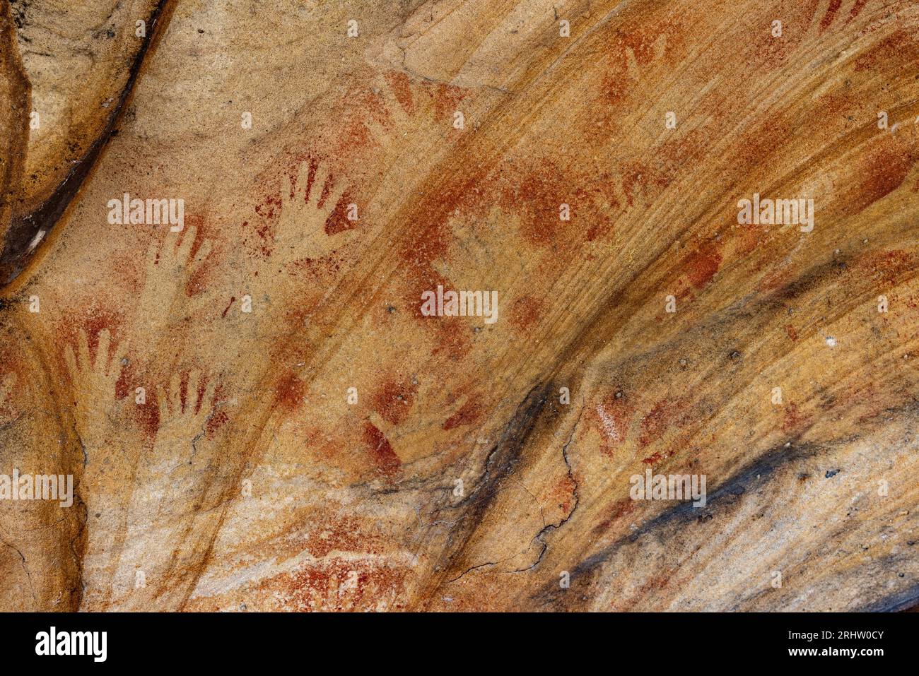 Australian Aboriginal hand stencils in a sandstone cave in the Sydney ...
