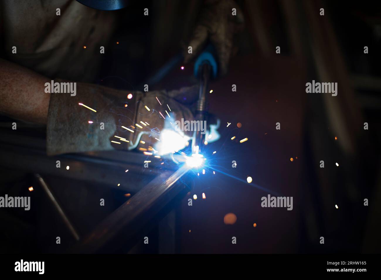 Steel welding. Metal seam welding. High temperature blue. Metal work ...