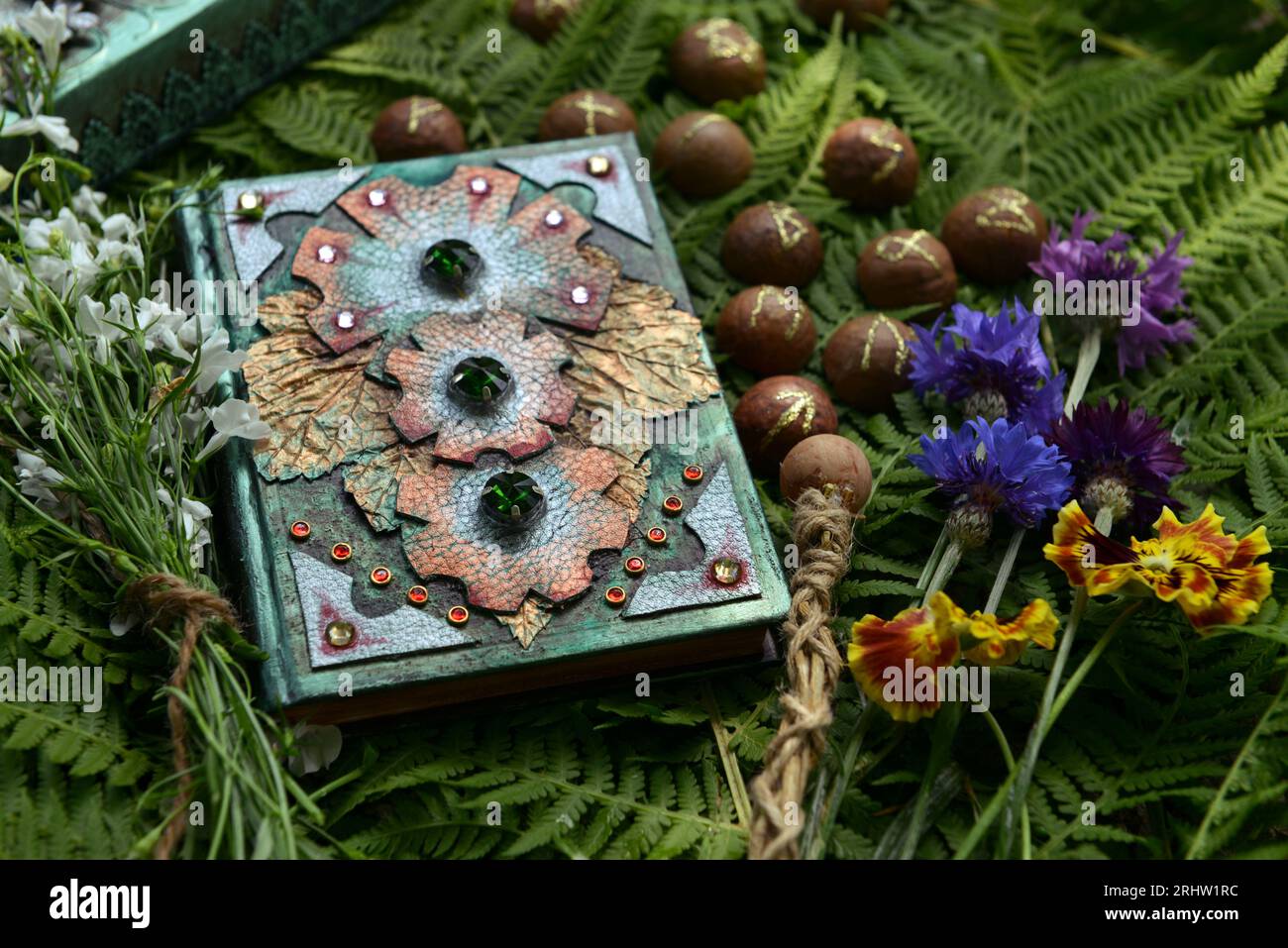 Still life with beautiful magic book of spells or diary and runes ...