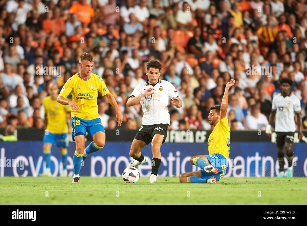 Martin Tejon of Valencia CF, Sinkgraven of UD Las Palmas in action ...