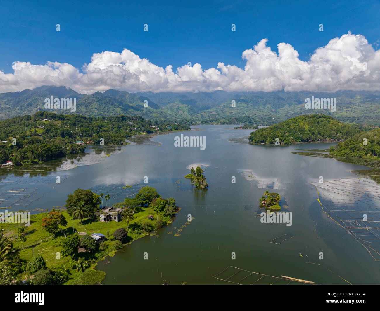 Drone survey of Lake Sebu surrounded by dry land, mountain forest ...