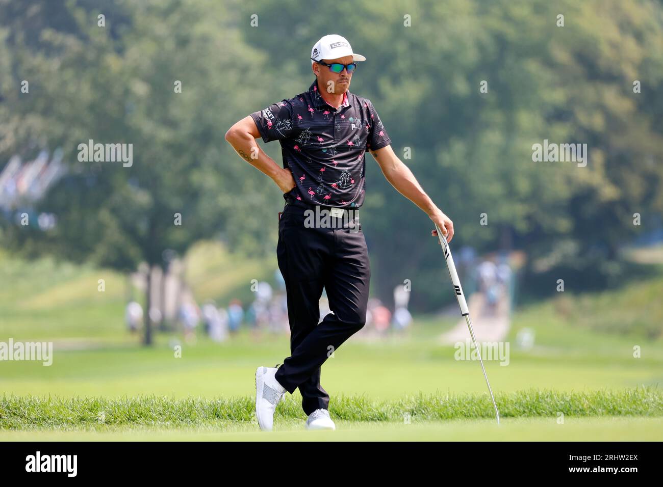OLYMPIA FIELDS, IL - AUGUST 18: PGA golfer Rickie Fowler putts on the 7th hole during the second ...