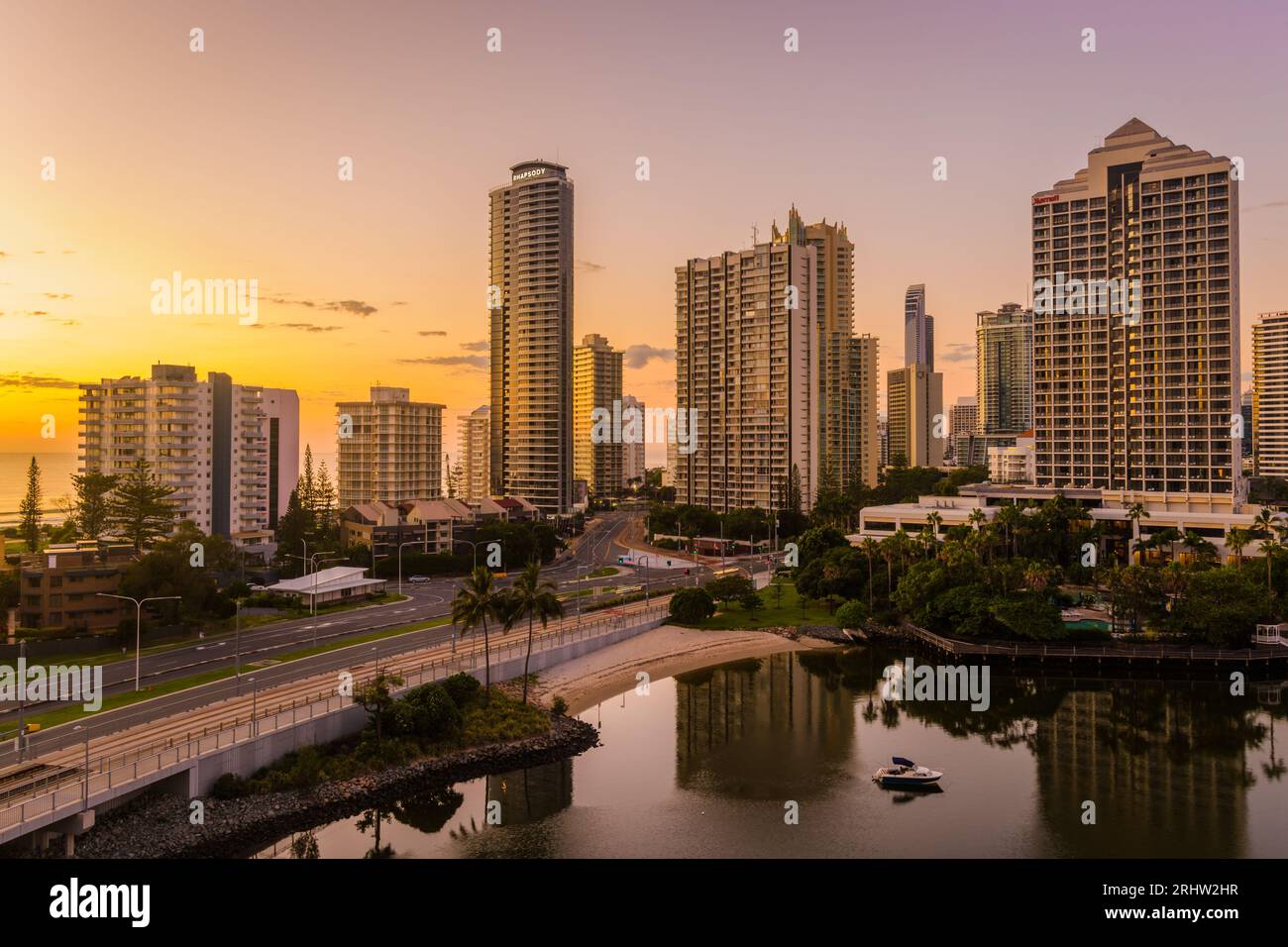 A spectacular sunrise illuminates the Surfers paradise high-rise ...