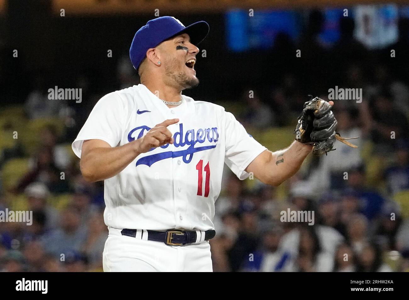 Los Angeles Dodgers relief pitcher Miguel Rojas, normally an infielder ...
