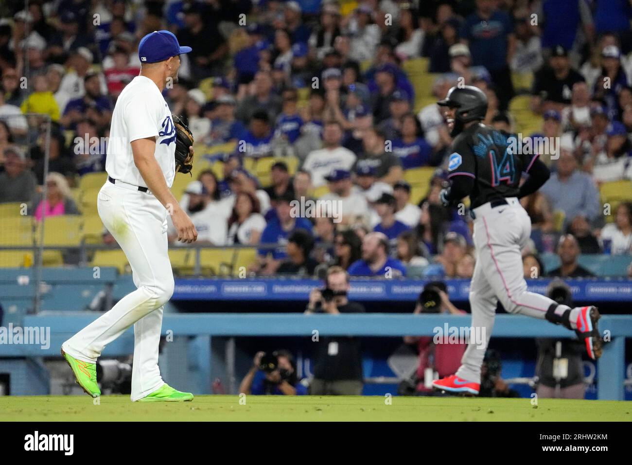 Los Angeles Dodgers relief pitcher Miguel Rojas, normally an infielder ...