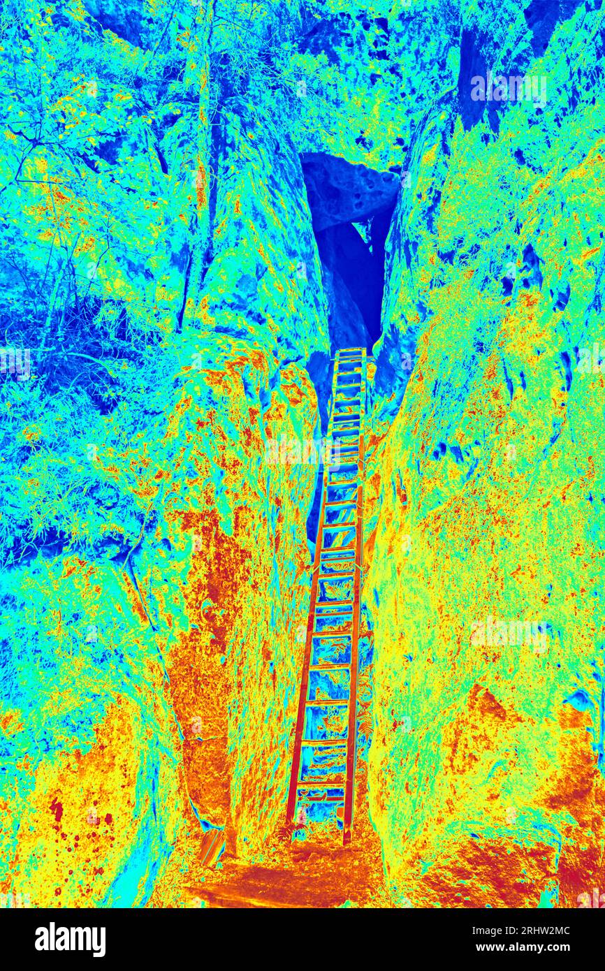 Steel path like steps and ladder in thin gulch between sandstone rocks ...