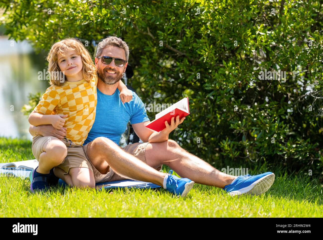 Father and son connect through stories in nature. Father and son ...