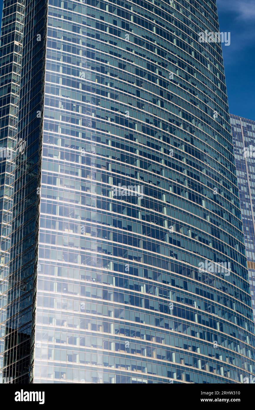 skyscraper with glassy facade. modern glass building. skyscraper in ...