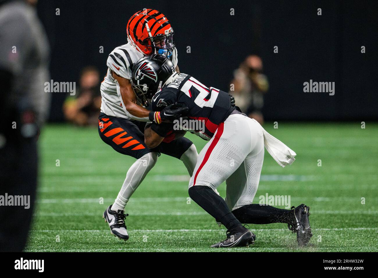 Atlanta Falcons running back Carlos Washington Jr. (28) is tackled by ...
