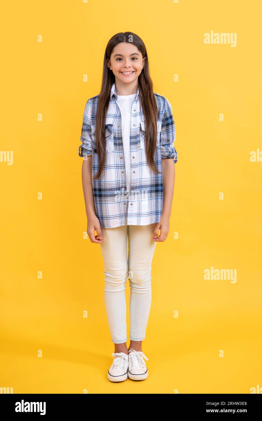 teen girl with long hair of gen z wearing stylish shirt for everyday ...