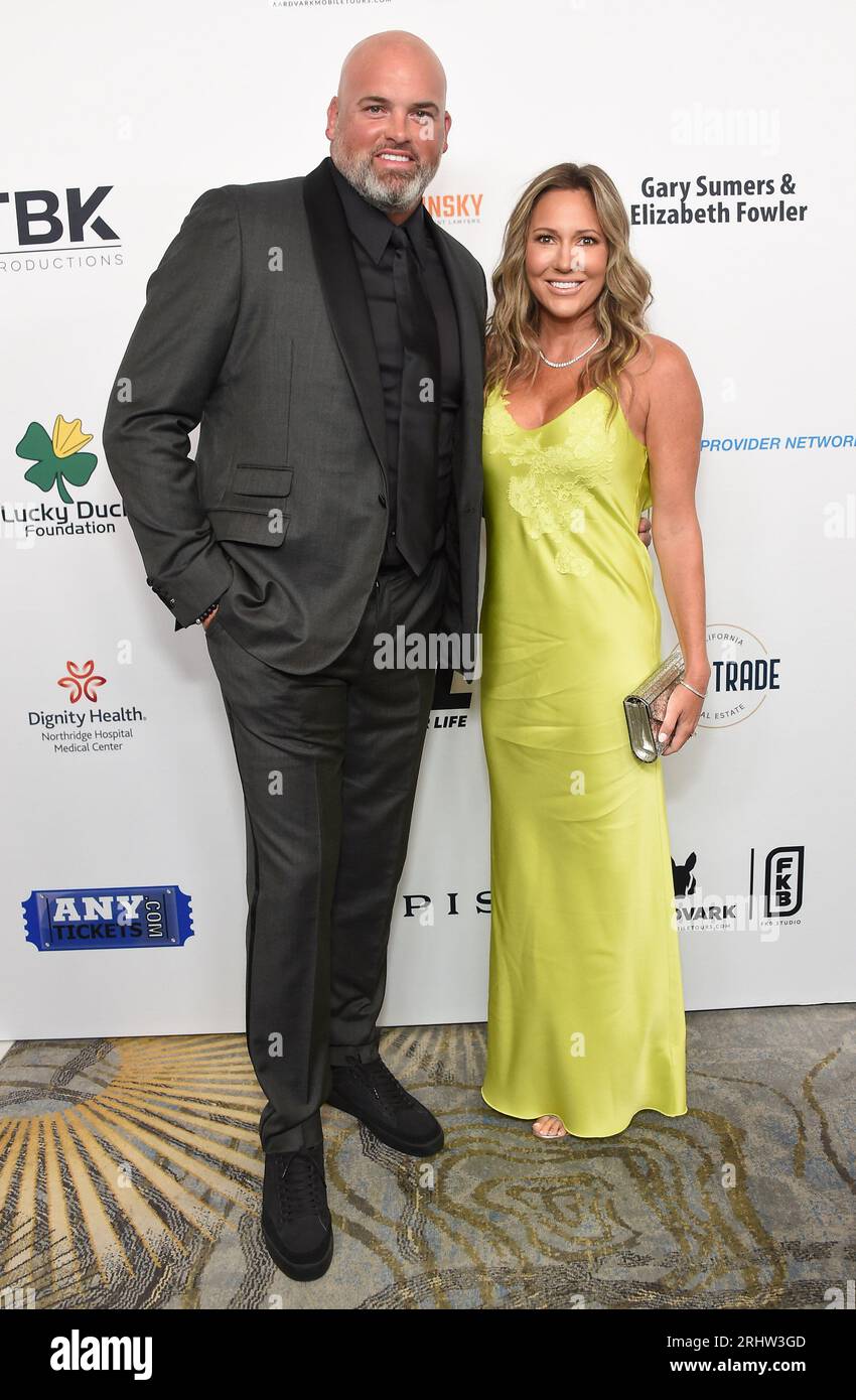 Beverly Hills, USA. 18th Aug, 2023. Andrew Whitworth and Melissa ...