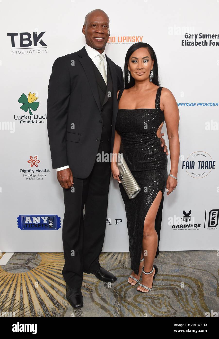 Beverly Hills, USA. 18th Aug, 2023. Byron Scott and Cecilia Gutierrez ...