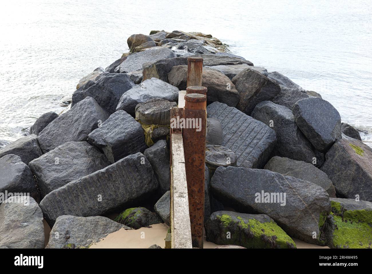 Sea defense rocks Stock Photo - Alamy