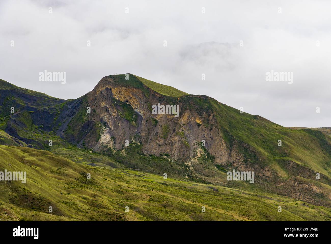 Dark Dramatic Desert Landscape with Foggy Mountains and Distant Houses ...