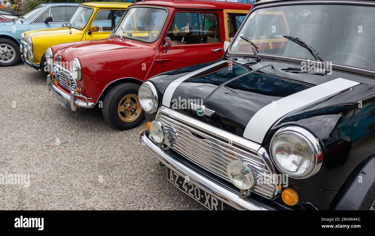 Pau , France - 08 17 2023 : Mini Cooper cars several vintage oldtimer ...