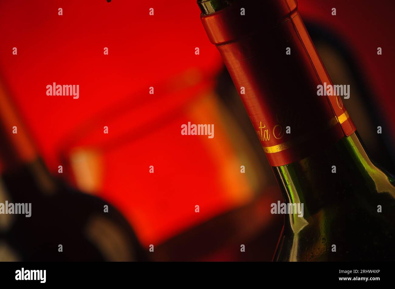 Bottle and glass of wine on the table, studio shot Stock Photo - Alamy