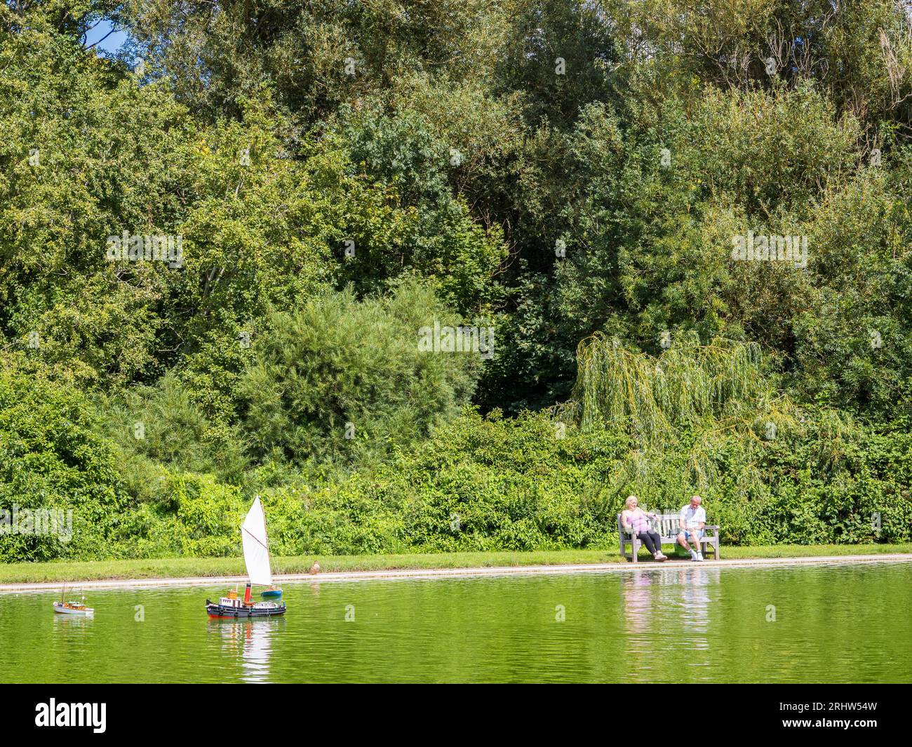 Eastrop Park, Couple Watching model Boat, Lake, Basingstoke, Hampshire ...