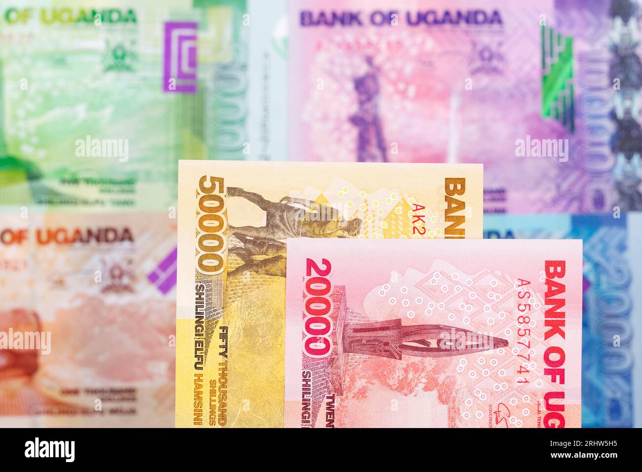 Ugandan money - shilling a business background Stock Photo - Alamy
