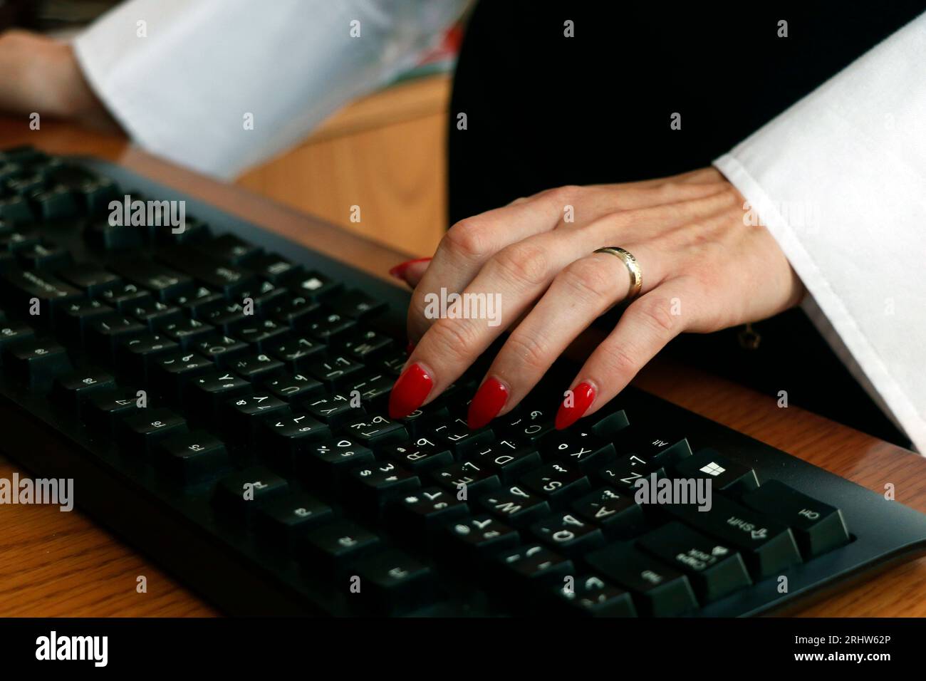 working office lady finger on computer or laptop black keyboard in ...
