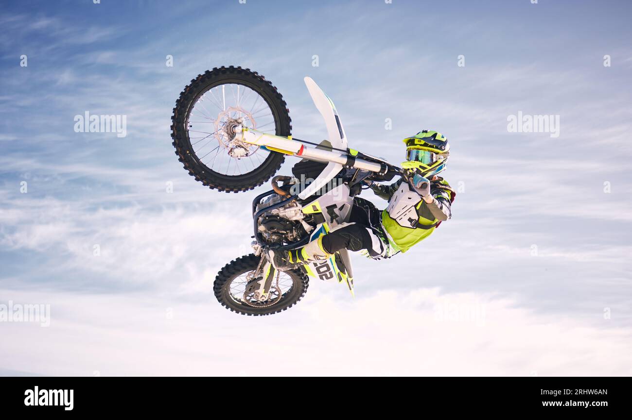 Sky, jump and man on off road motorbike for practice, training and ...