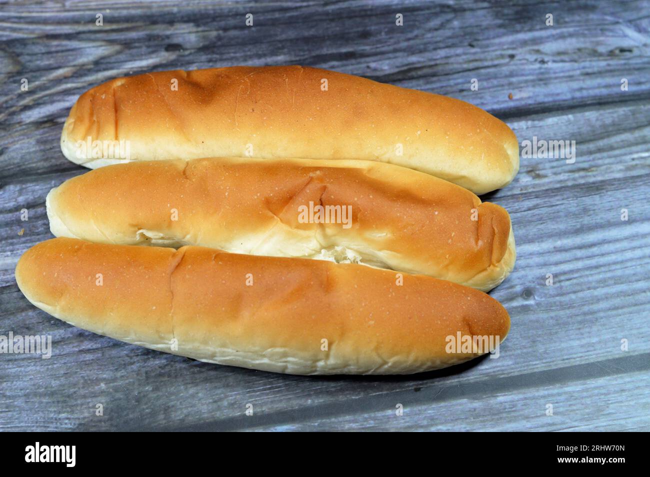 Long bun bread, a fresh baked loaf of bread French Fino ready to ...