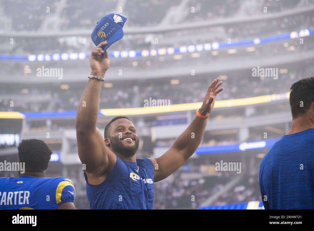 Los Angeles Rams defensive tackle Aaron Donald (99) waves towards the ...