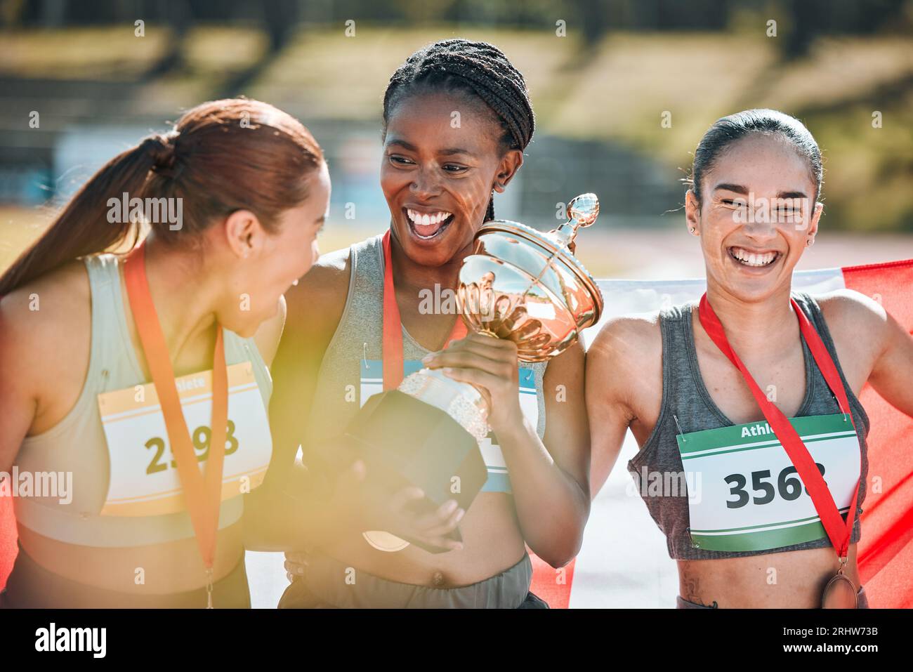 Athletics winner, trophy and sports women celebrate prize victory ...