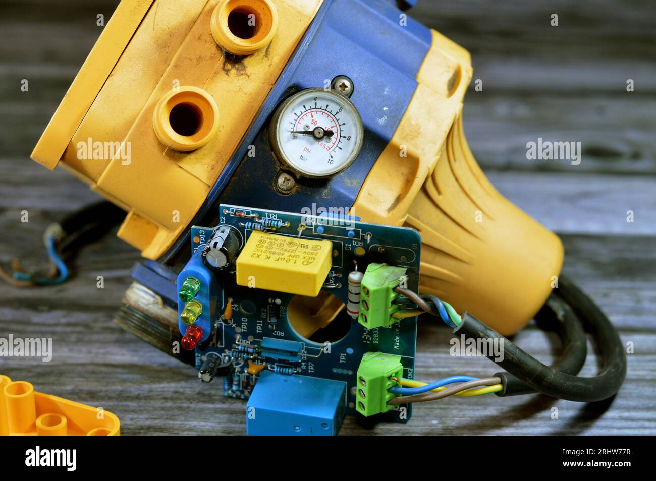 Cairo, Egypt, July 26 2023: Burnt water pump automatic pressure control ...