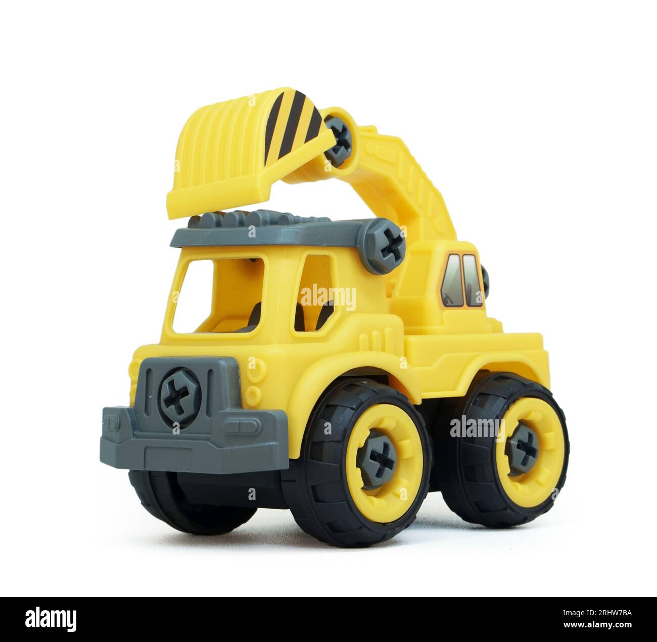 Yellow plastic truck toy isolated on white background. construction ...
